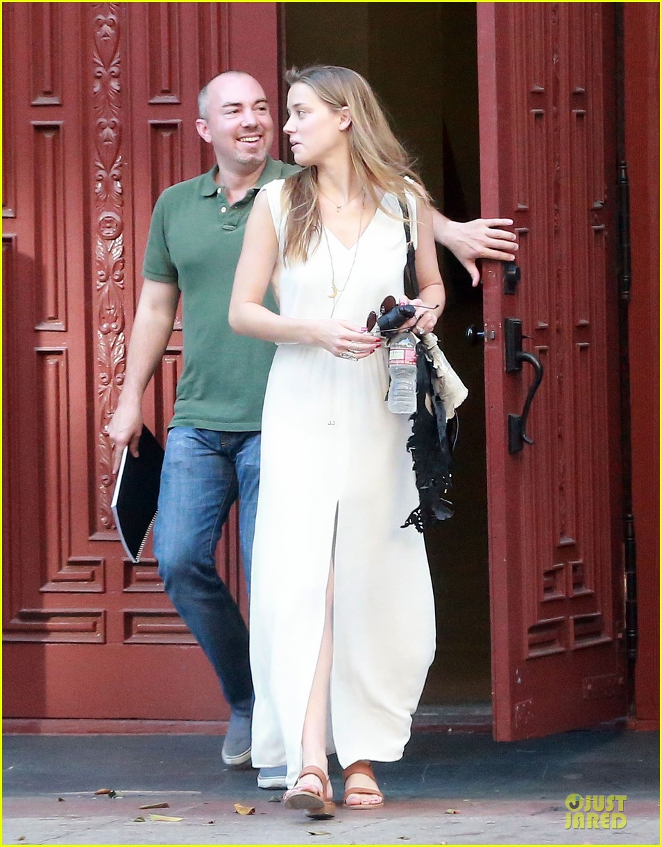 Amber Heard Brings All the Attention to Her Legs in High Slitted Dress ...