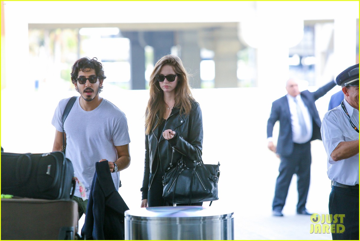 Dev Patel Flies Out of Town with a Mystery Brunette: Photo 3283988 ...