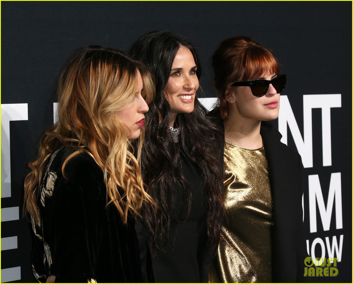 Miranda Kerr Steps Out for Saint Laurent Show Alongside Demi Moore ...