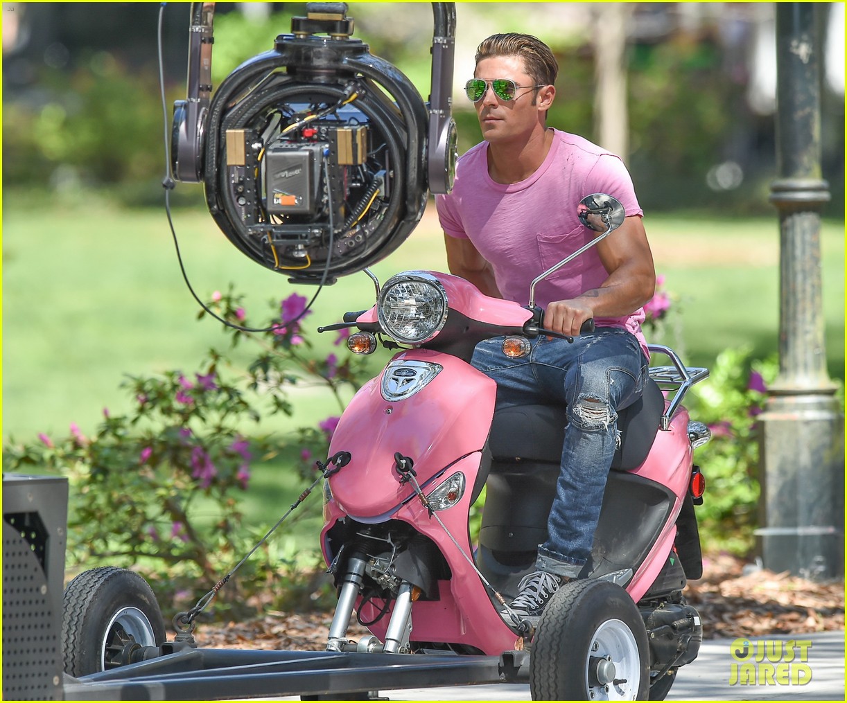 Zac Efron & Dwayne Johnson Take a Ride on a Hot Pink Scooter on ...