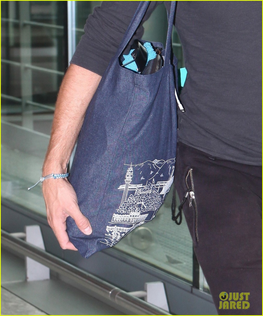Chris Martin Jets Out of London While on Tour With Coldplay: Photo ...