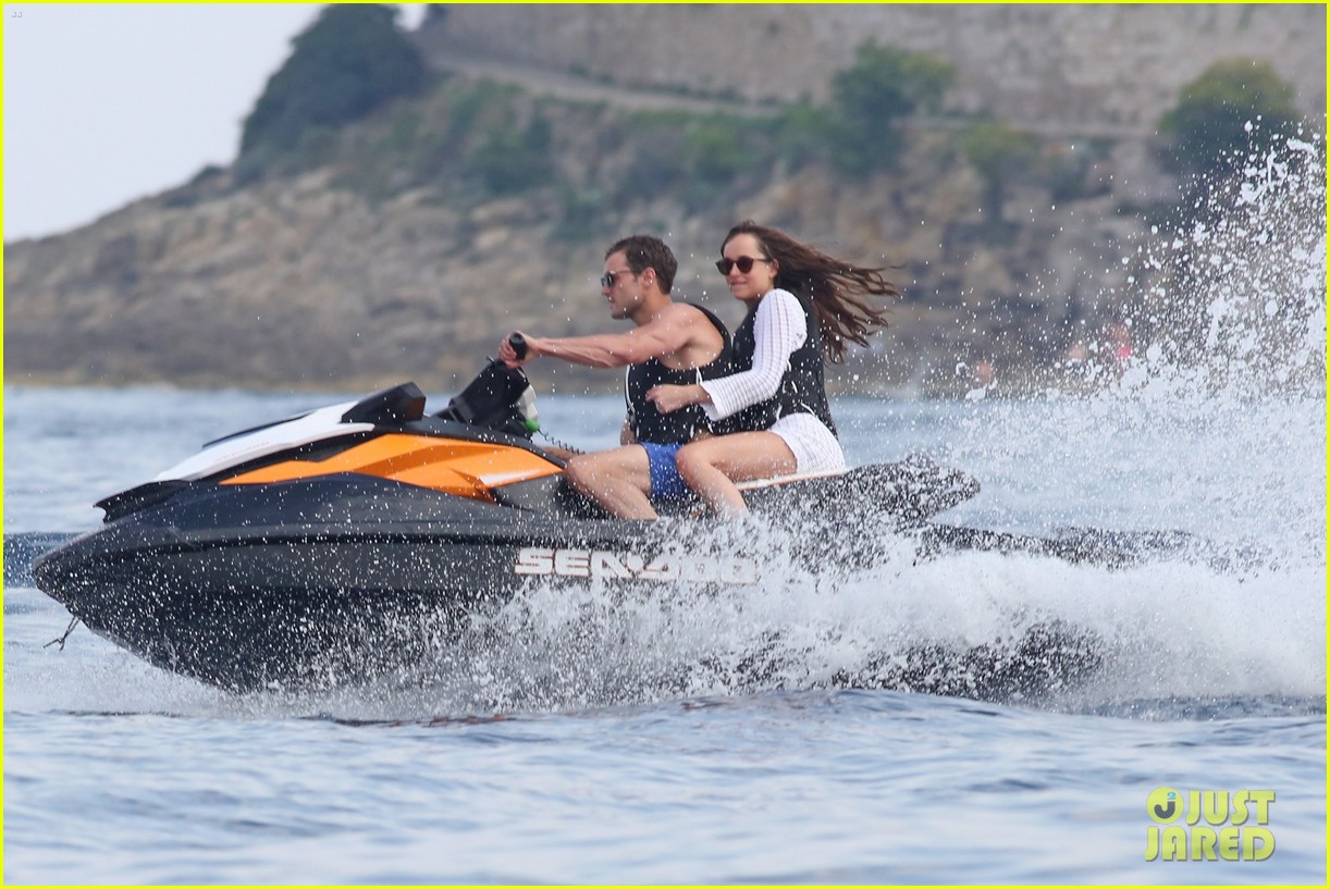 Jamie Dornan & Dakota Johnson Ride a Jet Ski for 'Fifty Shades Freed ...