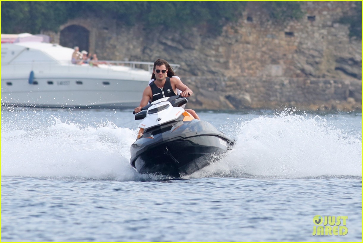 Jamie Dornan & Dakota Johnson Ride a Jet Ski for 'Fifty Shades Freed ...