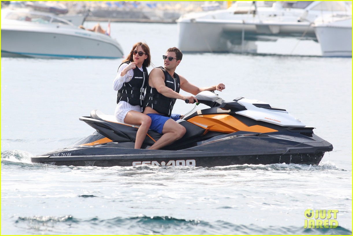 Jamie Dornan & Dakota Johnson Ride a Jet Ski for 'Fifty Shades Freed ...