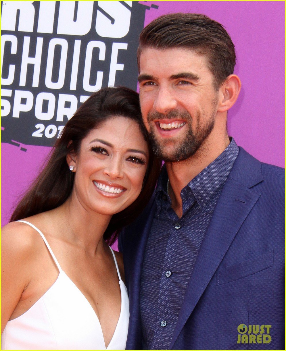 Michael Phelps & Wife Nicole Are the Cutest Couple at Kids' Choice ...