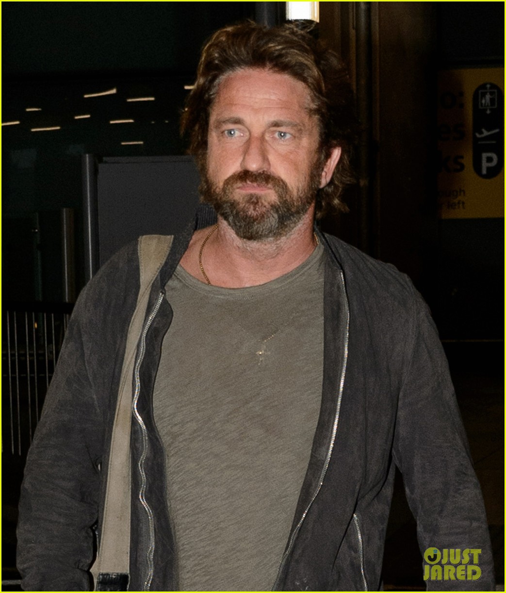 Gerard Butler Limps Off Plane in London Following Motorcycle Accident ...