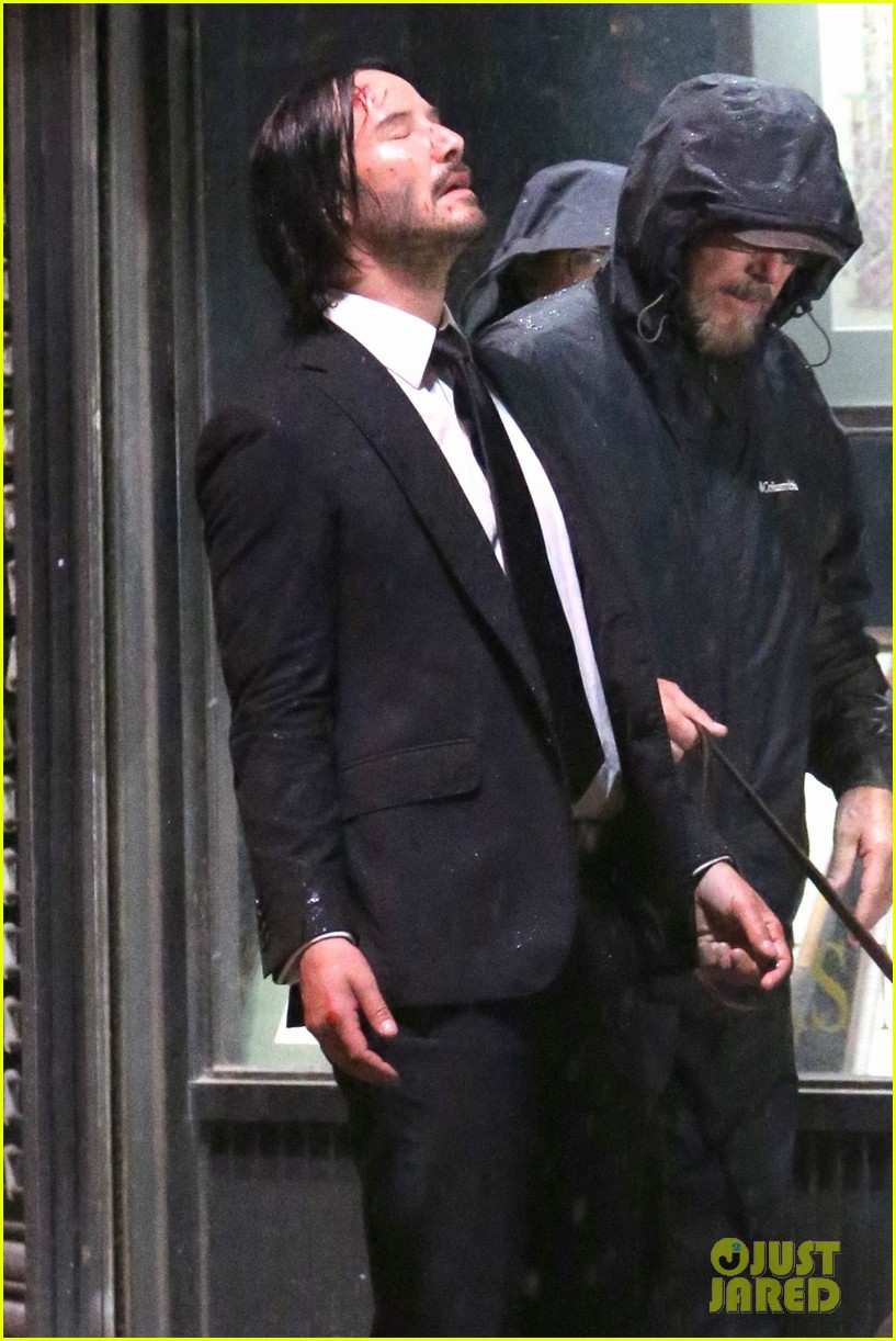 Keanu Reeves Gets Caught in the Rain Again for 'John Wick': Photo ...