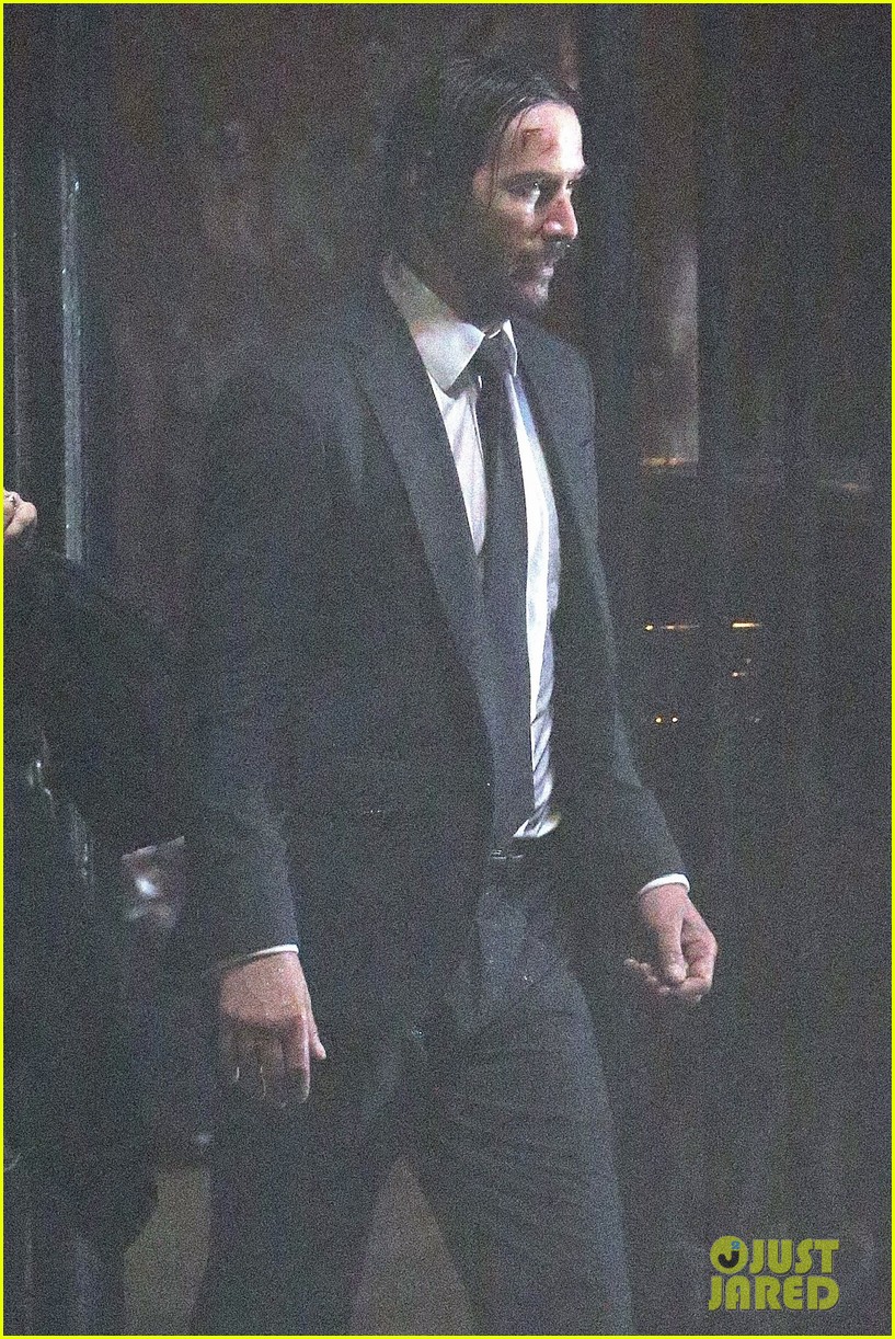 Keanu Reeves Gets Caught in the Rain Again for 'John Wick': Photo ...