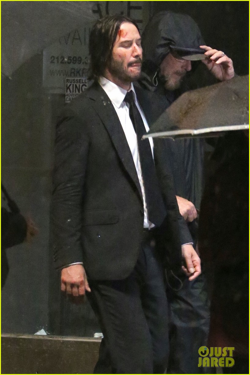 Keanu Reeves Gets Caught in the Rain Again for 'John Wick': Photo ...
