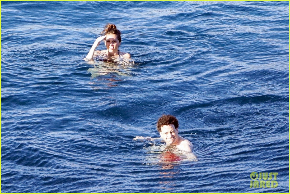 Felicity Jones & Husband Charles Guard Hit the Beach During Their ...