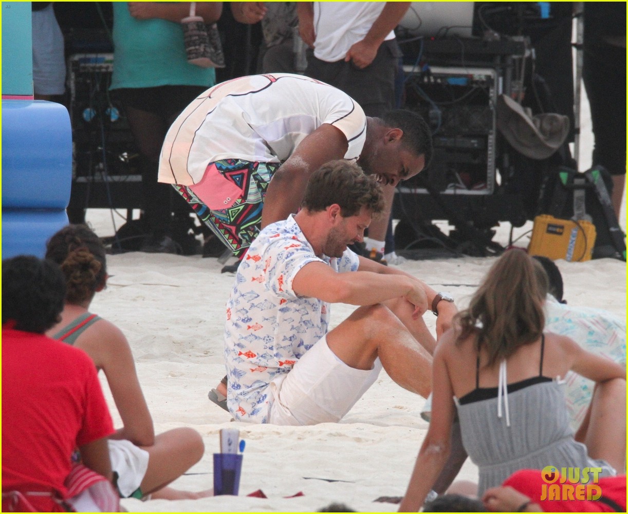 Jamie Dornan Wrestles Damon Wayans Jr. on the Beach for Upcoming Movie ...