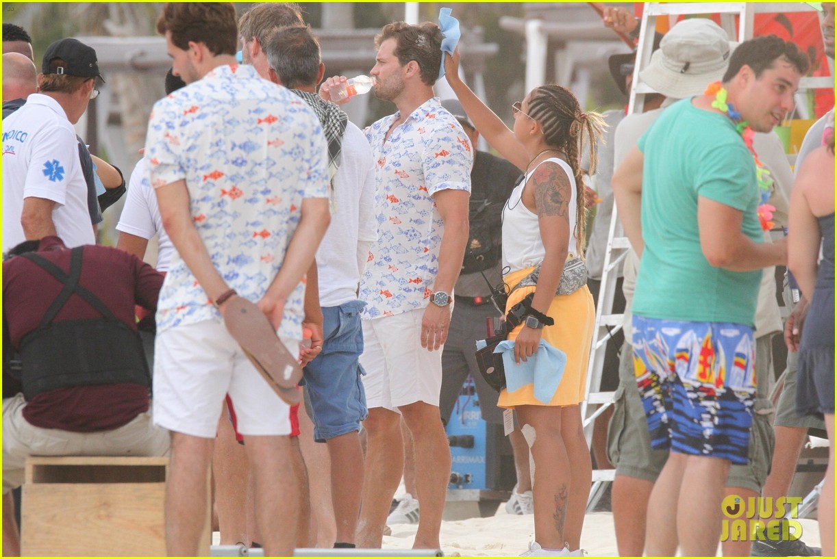 Jamie Dornan Wrestles Damon Wayans Jr. on the Beach for Upcoming Movie ...