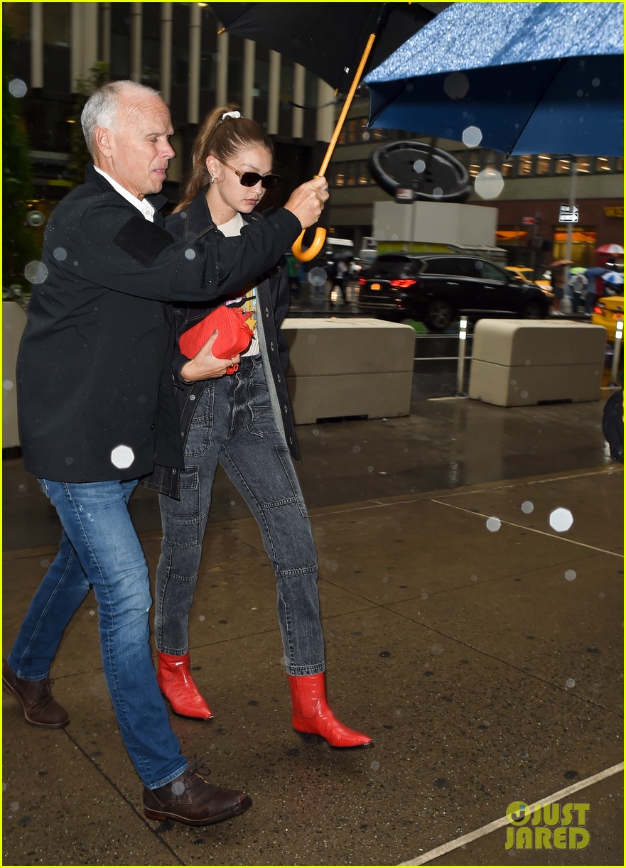 Gigi Hadid Pairs Dark Denim With Red Boots for NYFW Fittings: Photo ...