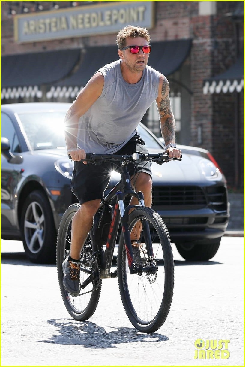 Ryan Phillippe Bares Tattooed Muscles on Bike Ride with Son Deacon ...