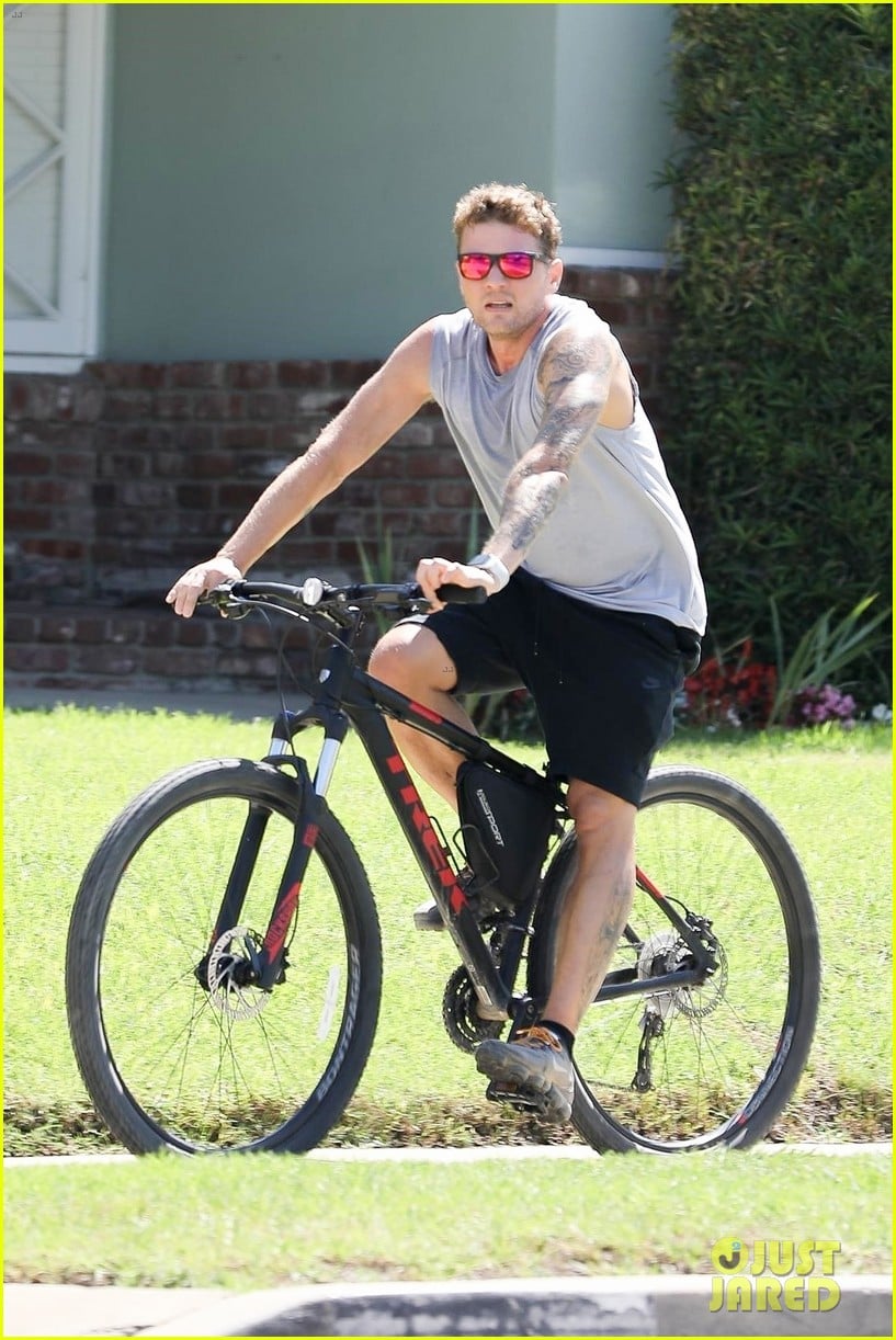 Ryan Phillippe Bares Tattooed Muscles on Bike Ride with Son Deacon ...