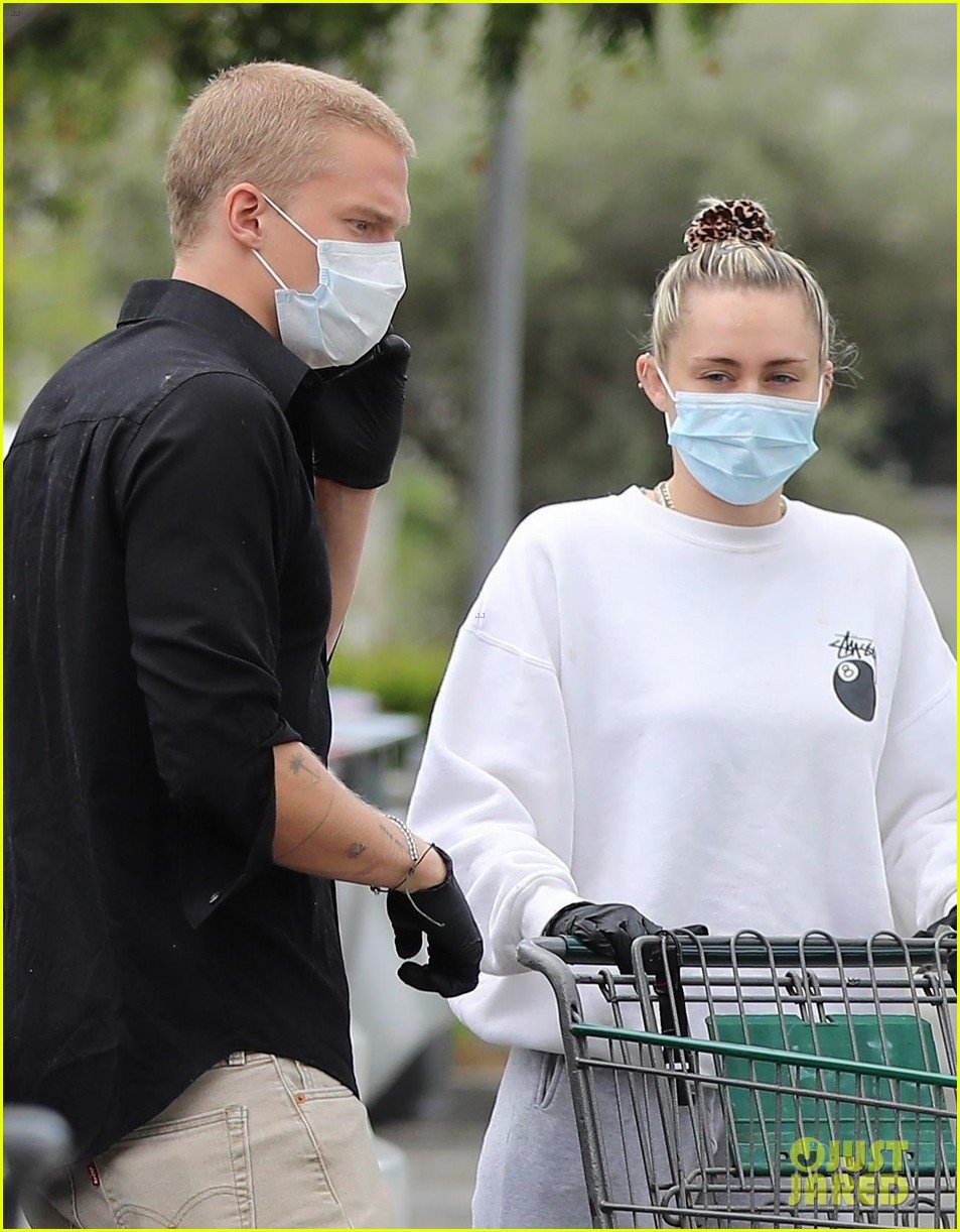 Miley Cyrus & Cody Simpson Stay Safe in Masks & Gloves While Stocking ...