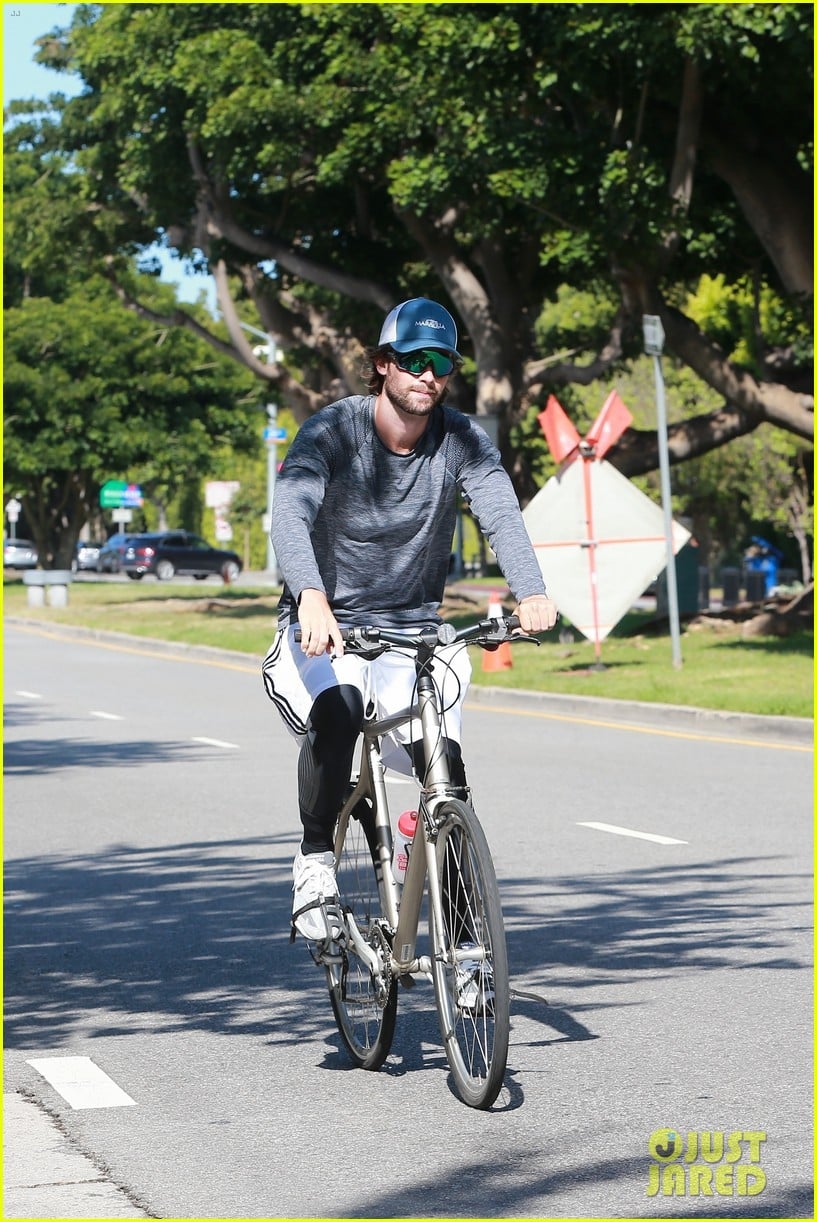 Patrick Schwarzenegger Throws Up the Peace Sign on Bike Ride: Photo ...