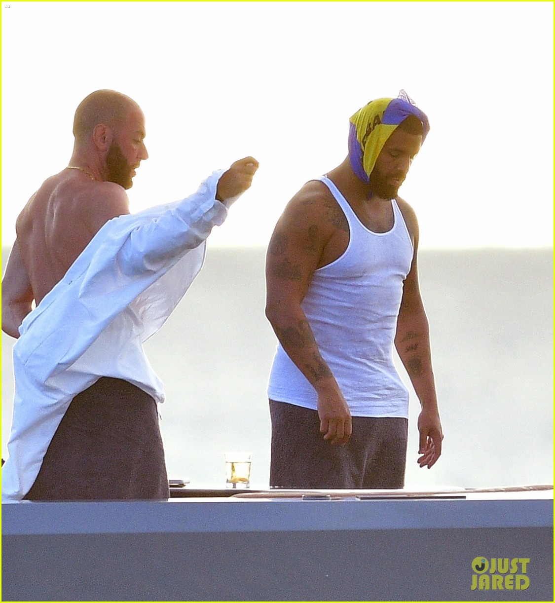 Drake Takes a Dive Into the Ocean While Boating in Barbados: Photo ...