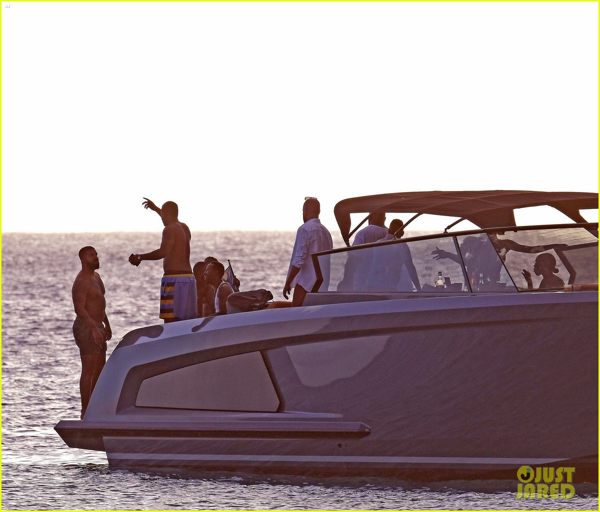 Drake Takes a Dive Into the Ocean While Boating in Barbados: Photo ...