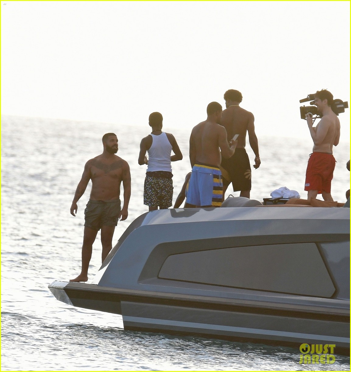 Drake Takes a Dive Into the Ocean While Boating in Barbados: Photo ...