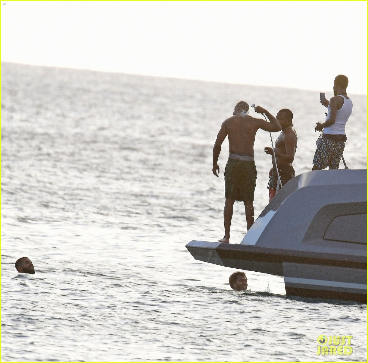 Drake Takes a Dive Into the Ocean While Boating in Barbados: Photo ...