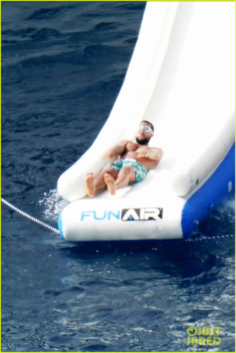 Shirtless John Legend Slides Down a Yacht During Family Vacation with ...
