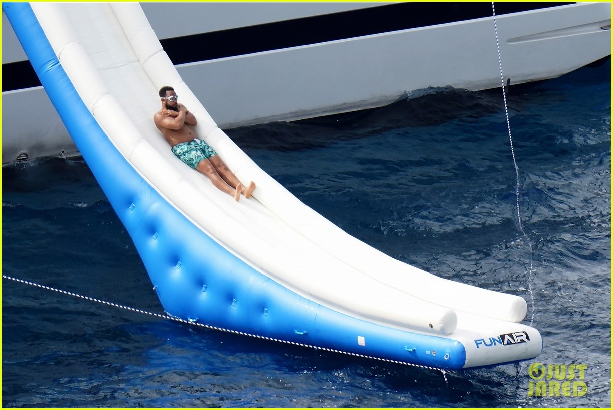 Shirtless John Legend Slides Down a Yacht During Family Vacation with ...