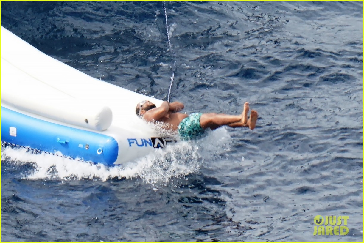 Shirtless John Legend Slides Down a Yacht During Family Vacation with ...