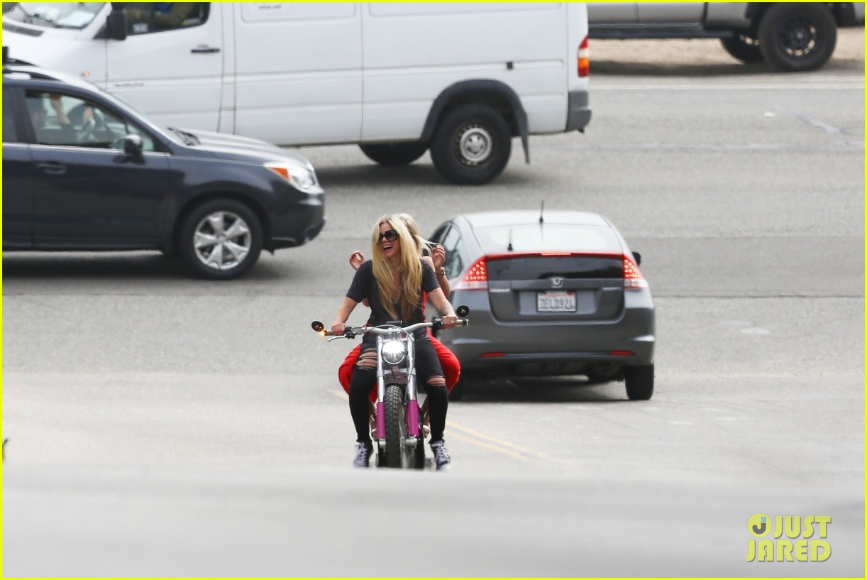 Avril Lavigne Rides A Hot Pink Motorcycle During Memorial Day Holiday ...