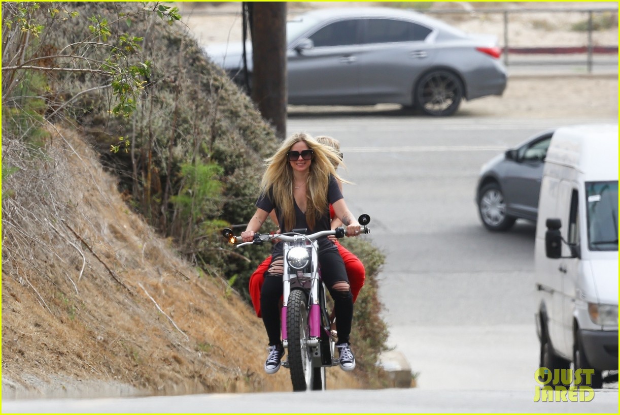 Avril Lavigne Rides A Hot Pink Motorcycle During Memorial Day Holiday ...
