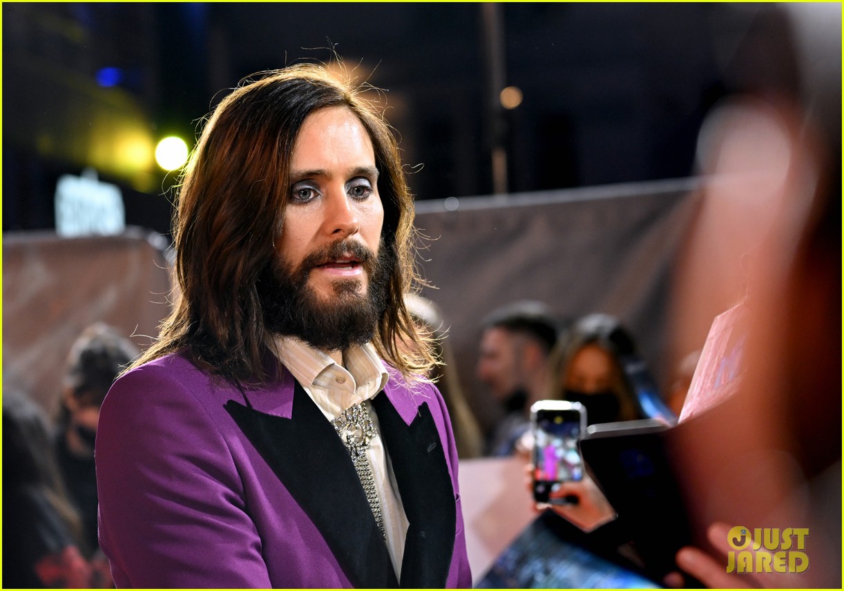Jared Leto Sports Glittery Blue Eye Makeup & Purple Suit for 'Morbius ...