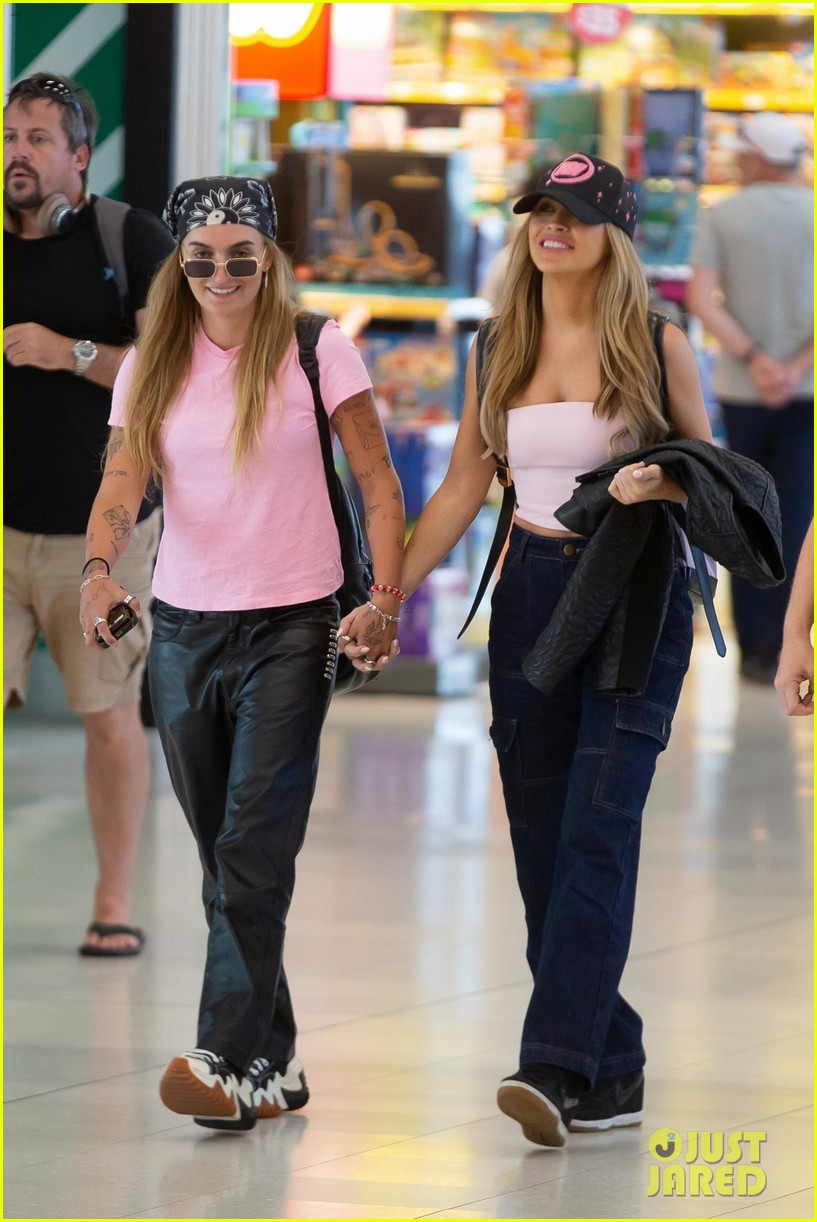 Chrishell Stause Holds Hands with Partner G-Flip While Arriving in Adelaide for Music Festival ...