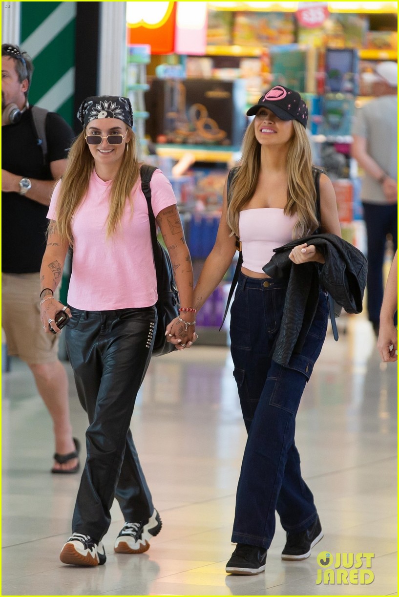 Chrishell Stause Holds Hands with Partner G-Flip While Arriving in Adelaide for Music Festival ...