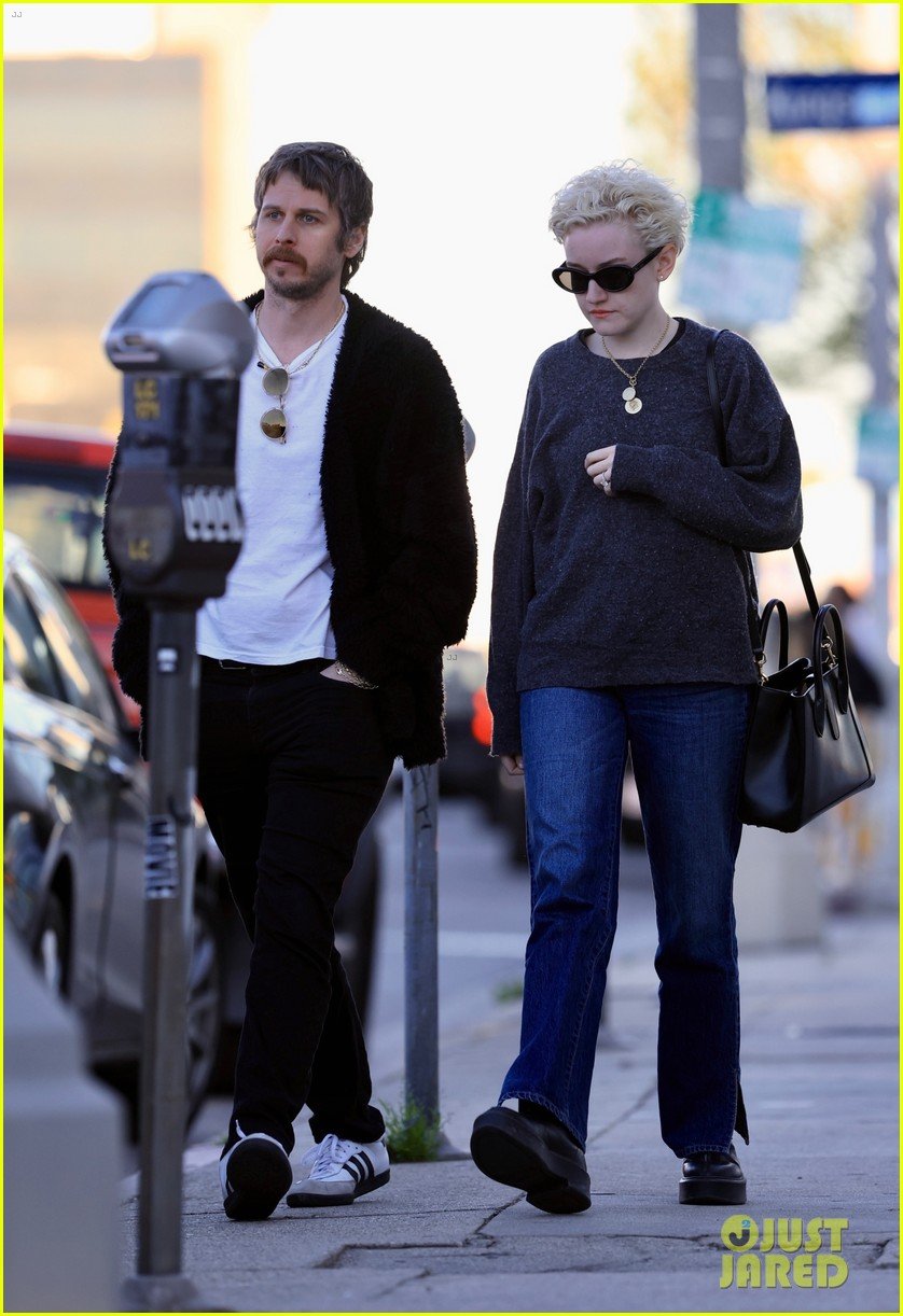 Julia Garner Steps Out with Husband Mark Foster After Madonna Biopic ...