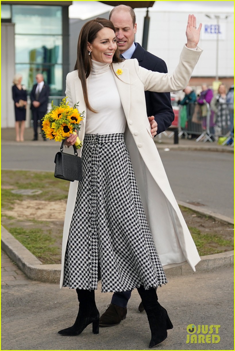 Kate Middleton Wins a Spin Bike Contest While Wearing a Skirt & Heels ...