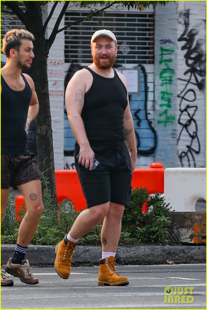 Sam Smith & Partner Christian Cowan Match In Black Tanks While Out in ...