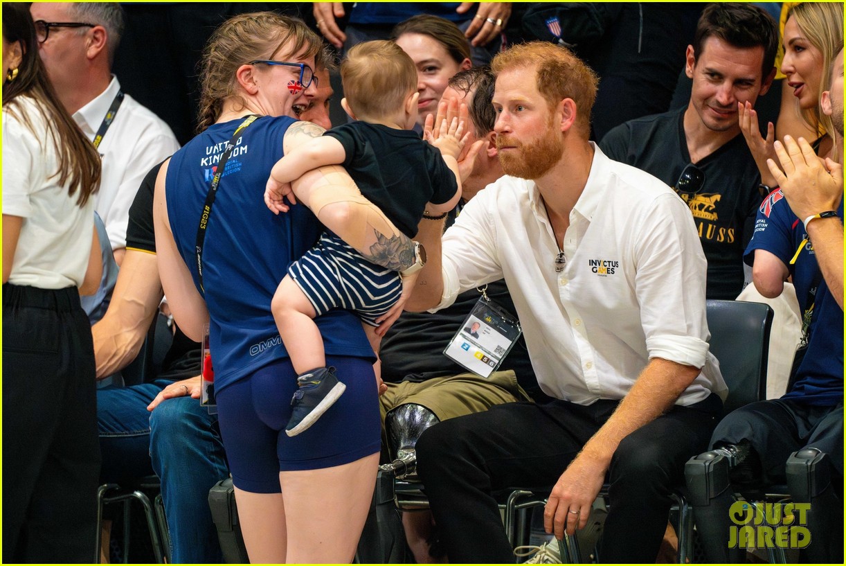 Prince Harry Says He & Meghan Markle Are A 'Competitive' Family During ...