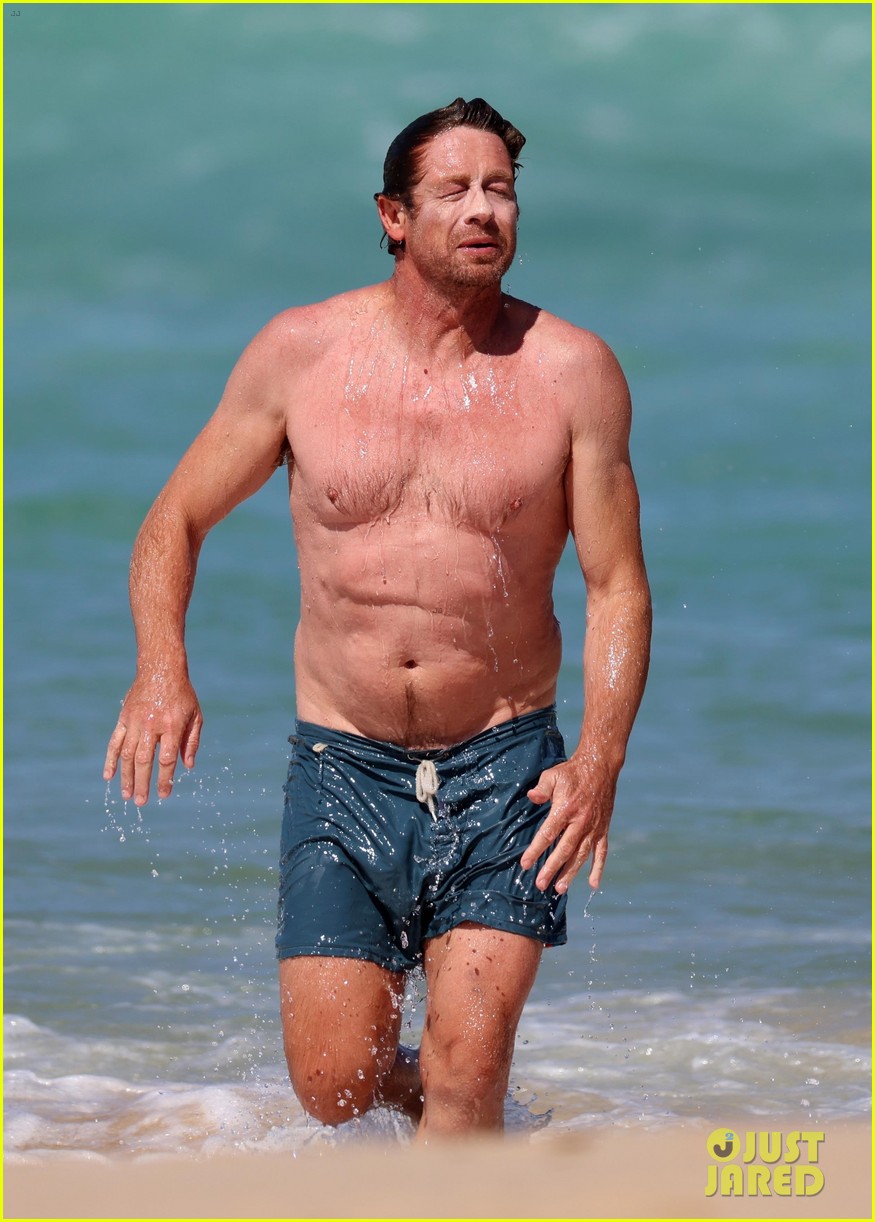 Simon Baker Hits the Beach for Shirtless Beach Day with Son Claude ...