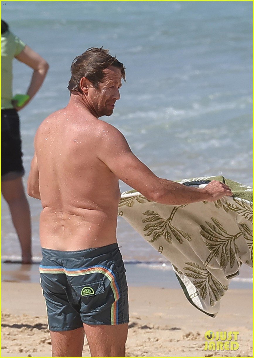 Simon Baker Hits the Beach for Shirtless Beach Day with Son Claude ...