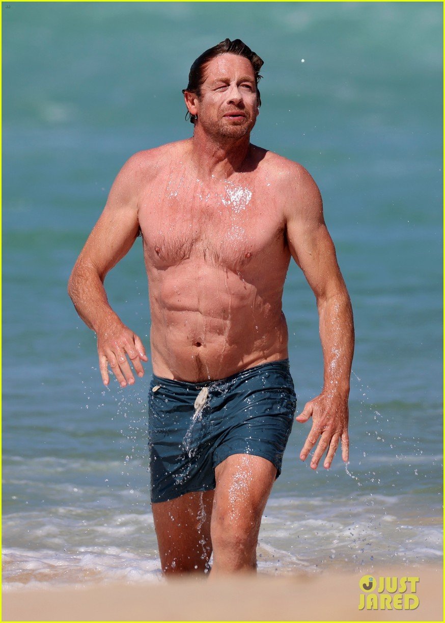 Simon Baker Hits the Beach for Shirtless Beach Day with Son Claude ...
