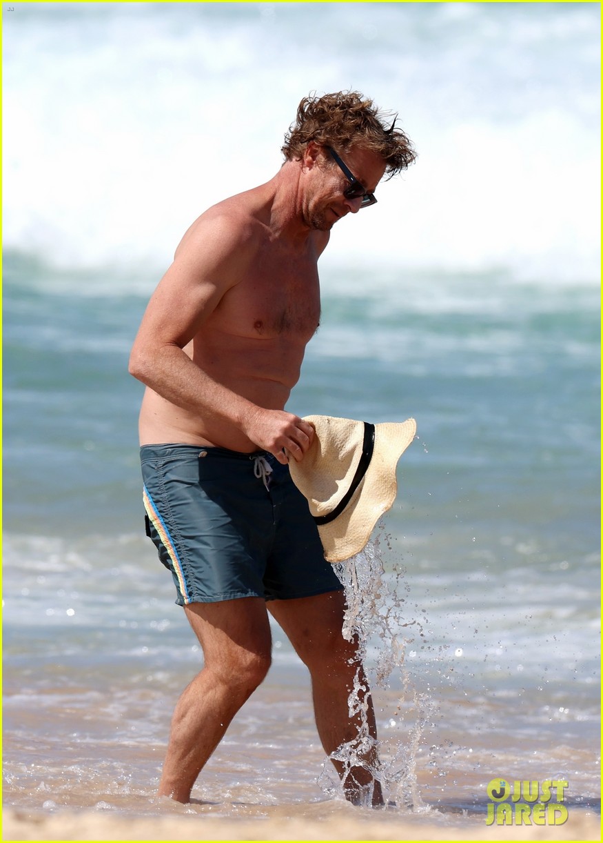 Simon Baker Hits the Beach for Shirtless Beach Day with Son Claude ...