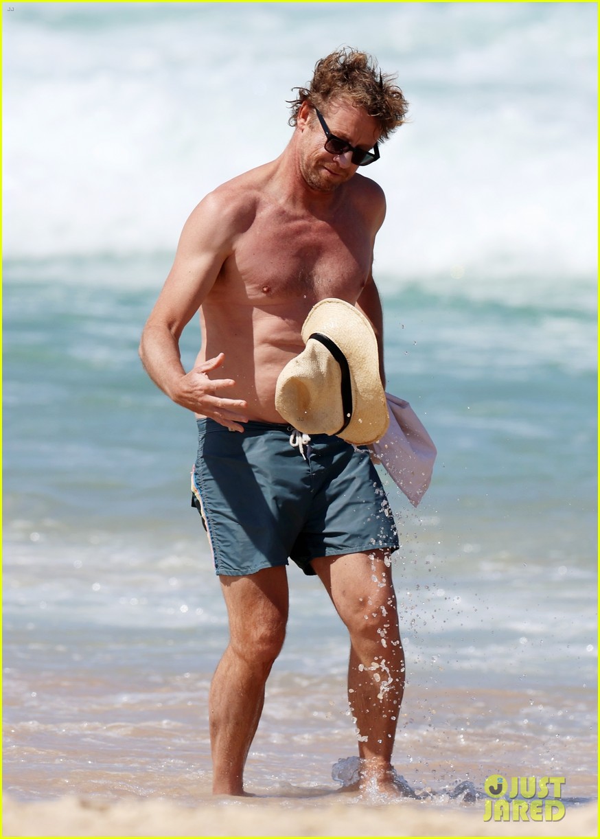 Simon Baker Hits the Beach for Shirtless Beach Day with Son Claude ...