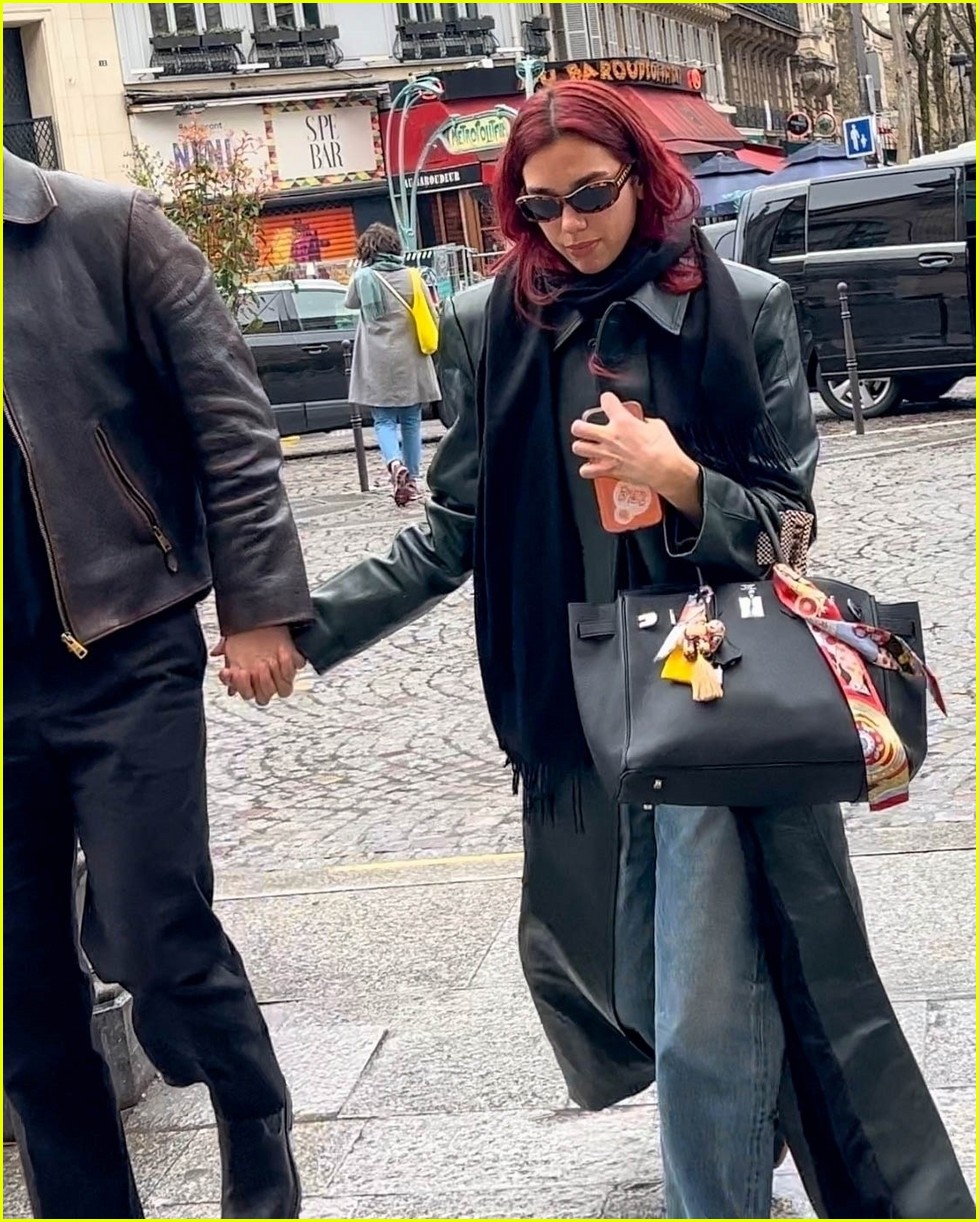 Dua Lipa & Callum Turner Hold Hands While Catching a Train from Paris ...