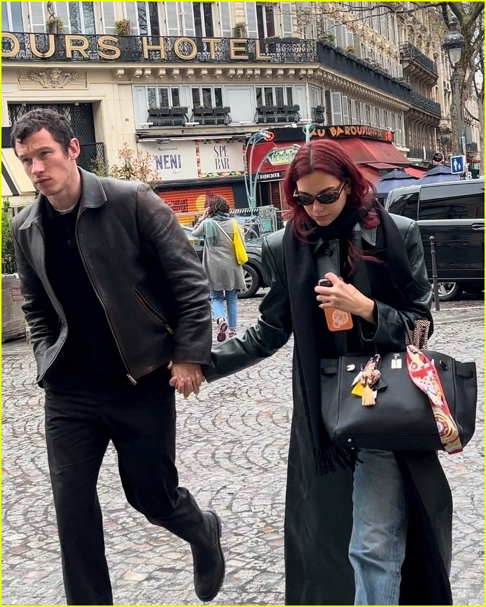 Dua Lipa & Callum Turner Hold Hands While Catching a Train from Paris ...