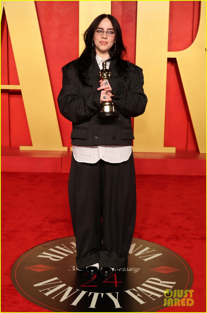 Flavor Flav Gifts Custom Clock Necklace to Billie Eilish at Vanity Fair ...