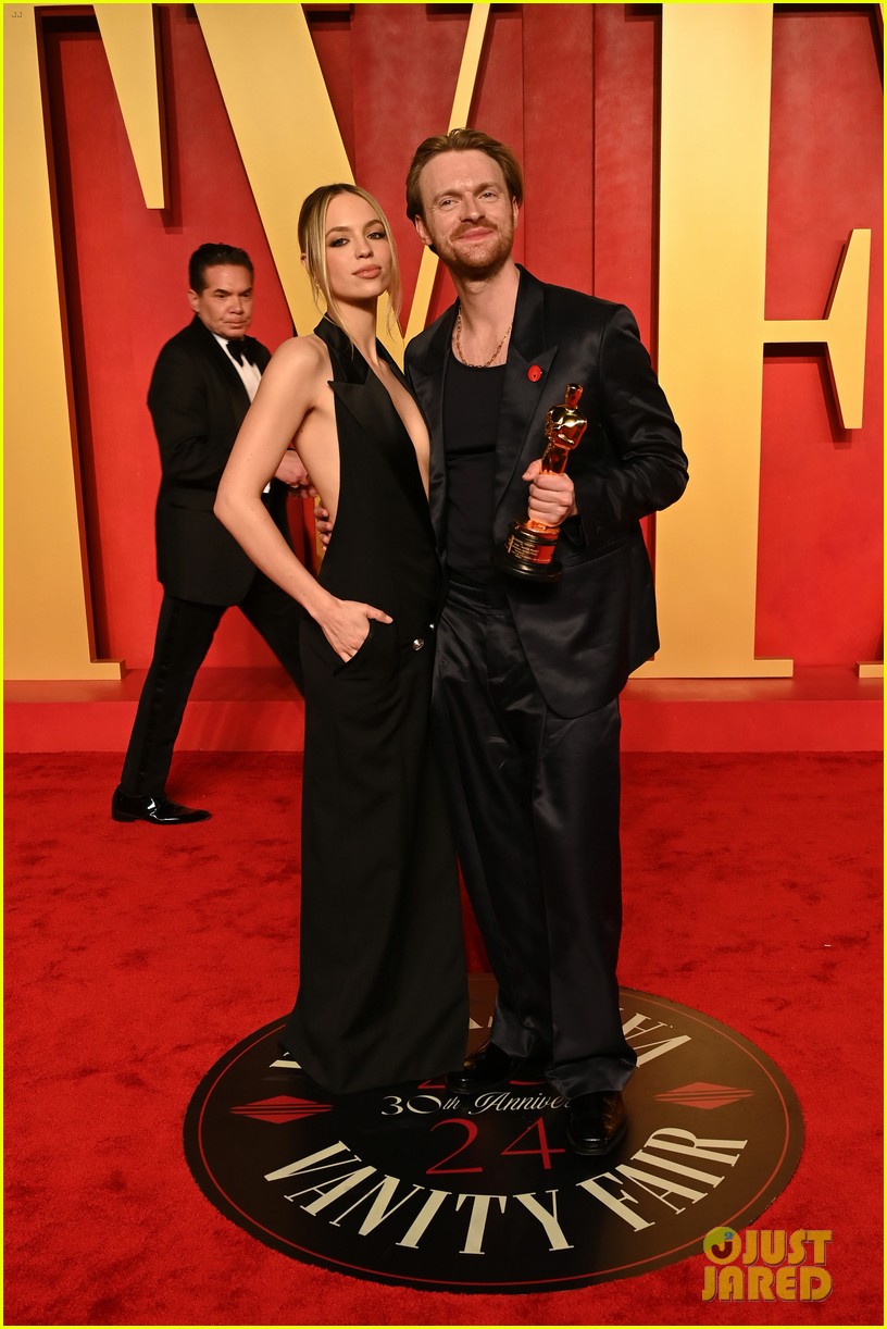 Flavor Flav Gifts Custom Clock Necklace to Billie Eilish at Vanity Fair ...