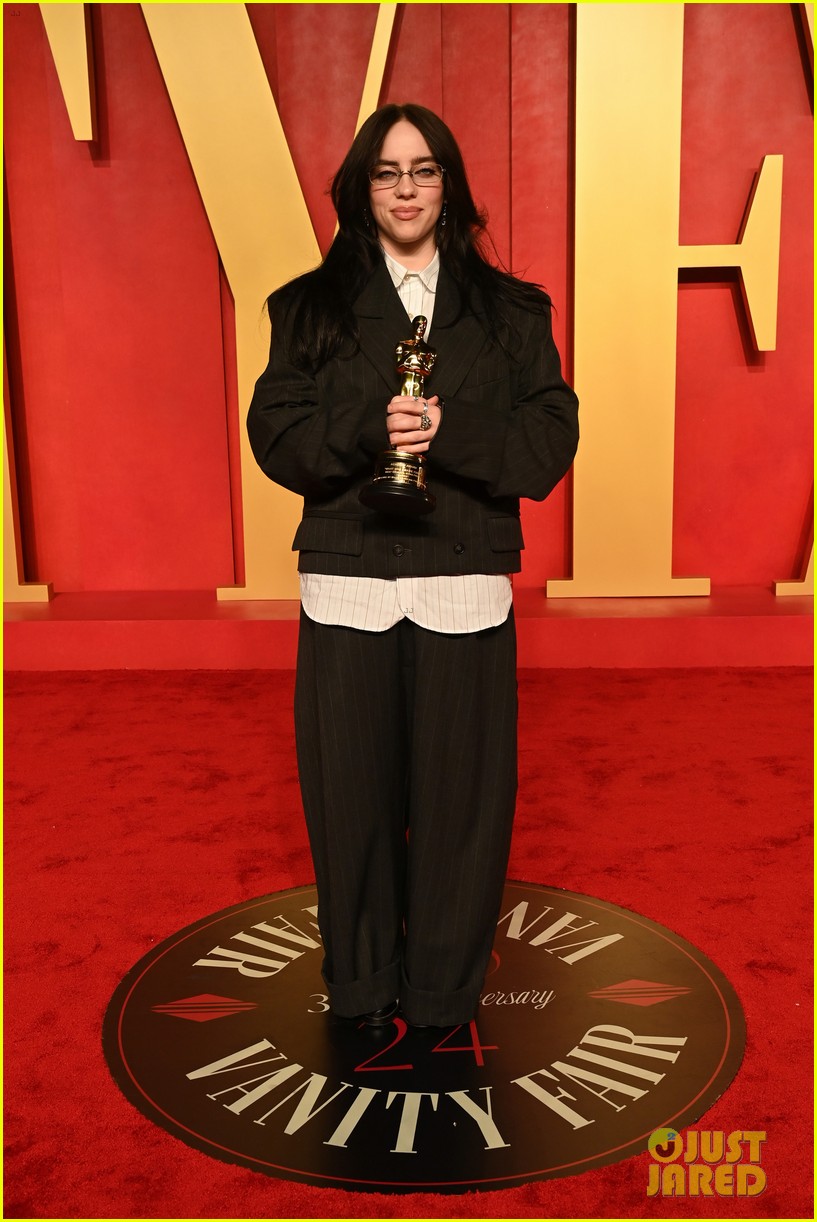 Flavor Flav Gifts Custom Clock Necklace to Billie Eilish at Vanity Fair ...
