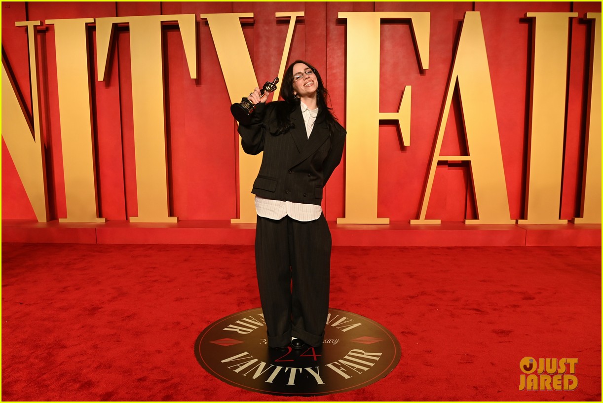 Flavor Flav Gifts Custom Clock Necklace to Billie Eilish at Vanity Fair ...