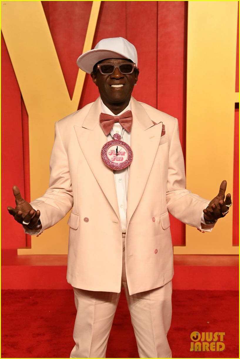 Flavor Flav Gifts Custom Clock Necklace to Billie Eilish at Vanity Fair ...