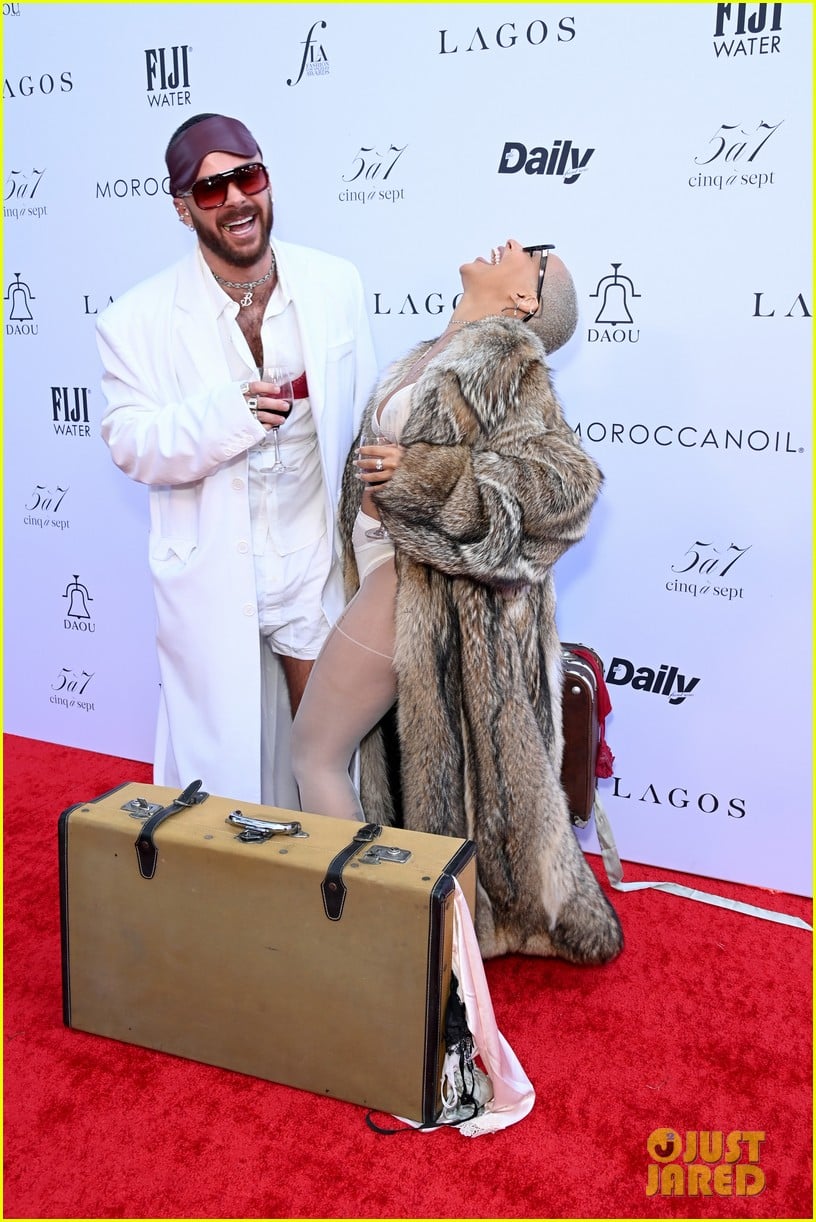 Doja Cat Brings Glass of Wine & Suitcase to Daily Front Row Fashion ...